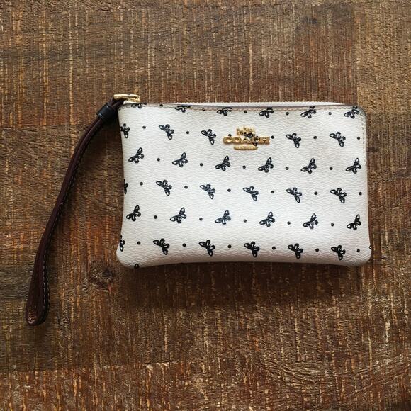 Coach | Bags | Coach Corner Zip Wristlet Butterfly Dot Cream Black ...